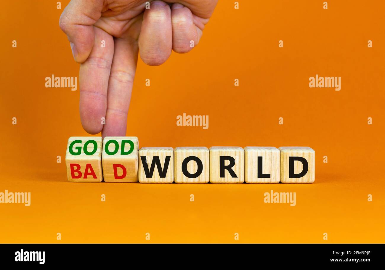 Good or bad world symbol. Businessman turns wooden cubes and changes ...