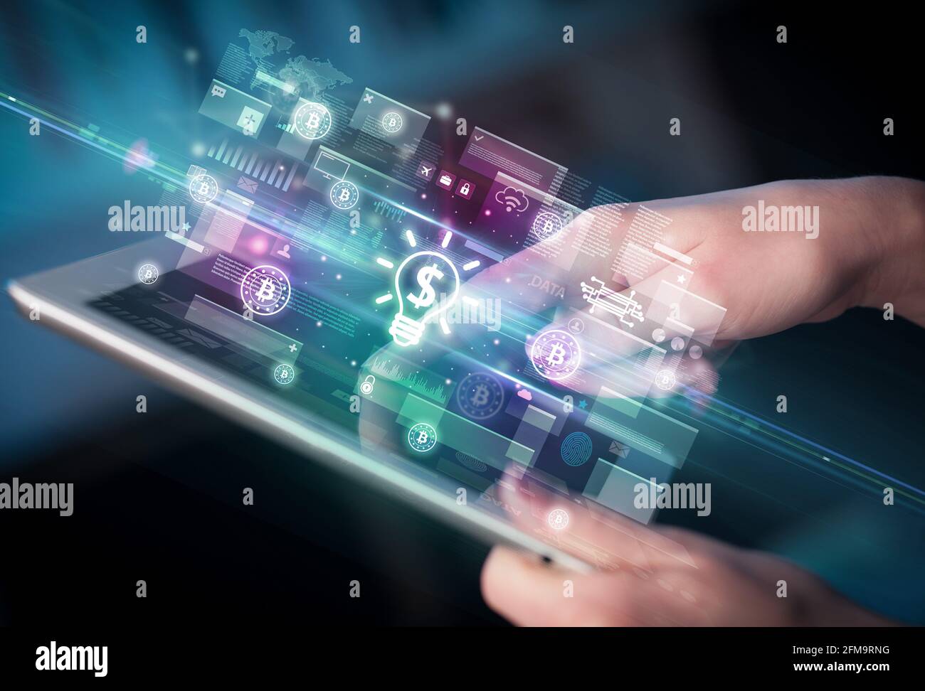 Close-up of a hand using tablet, currency concept Stock Photo - Alamy