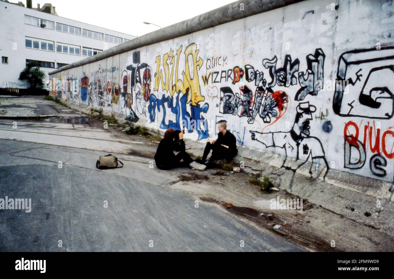 Berlin Wall, July 1984, photographer takes pictures of punk girl Stock ...