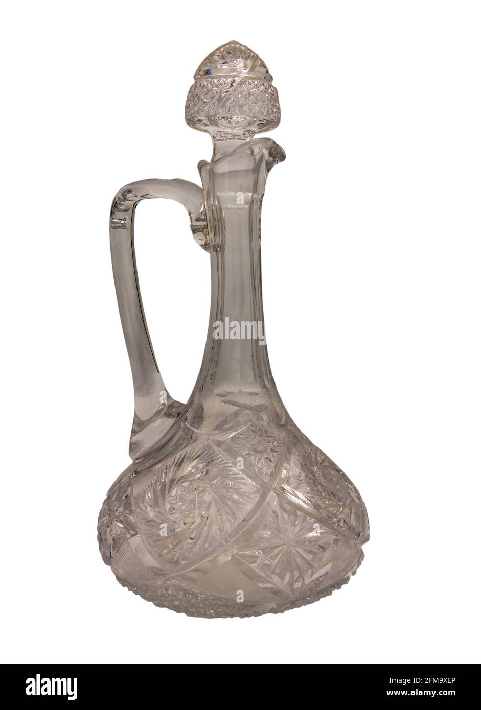 Empty antique crystal pitcher with glass handle and Closed with a glass ...