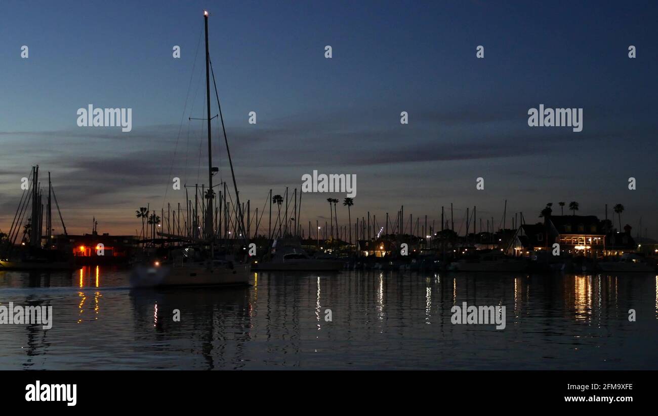 Luxury yachts sailboats floating, marina harbour quay. Sail boat masts ...
