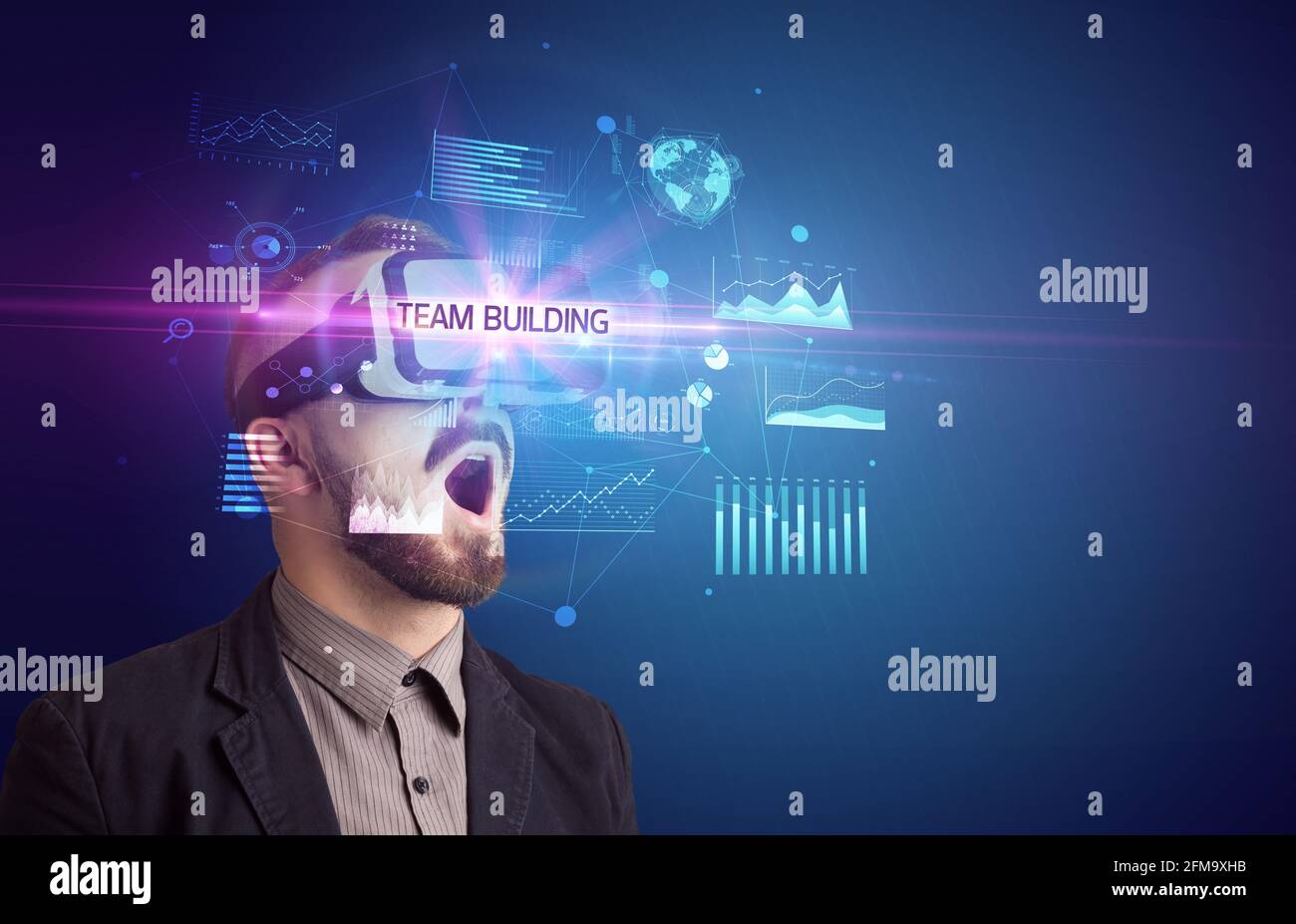Businessman looking through Virtual Reality glasses Stock Photo - Alamy