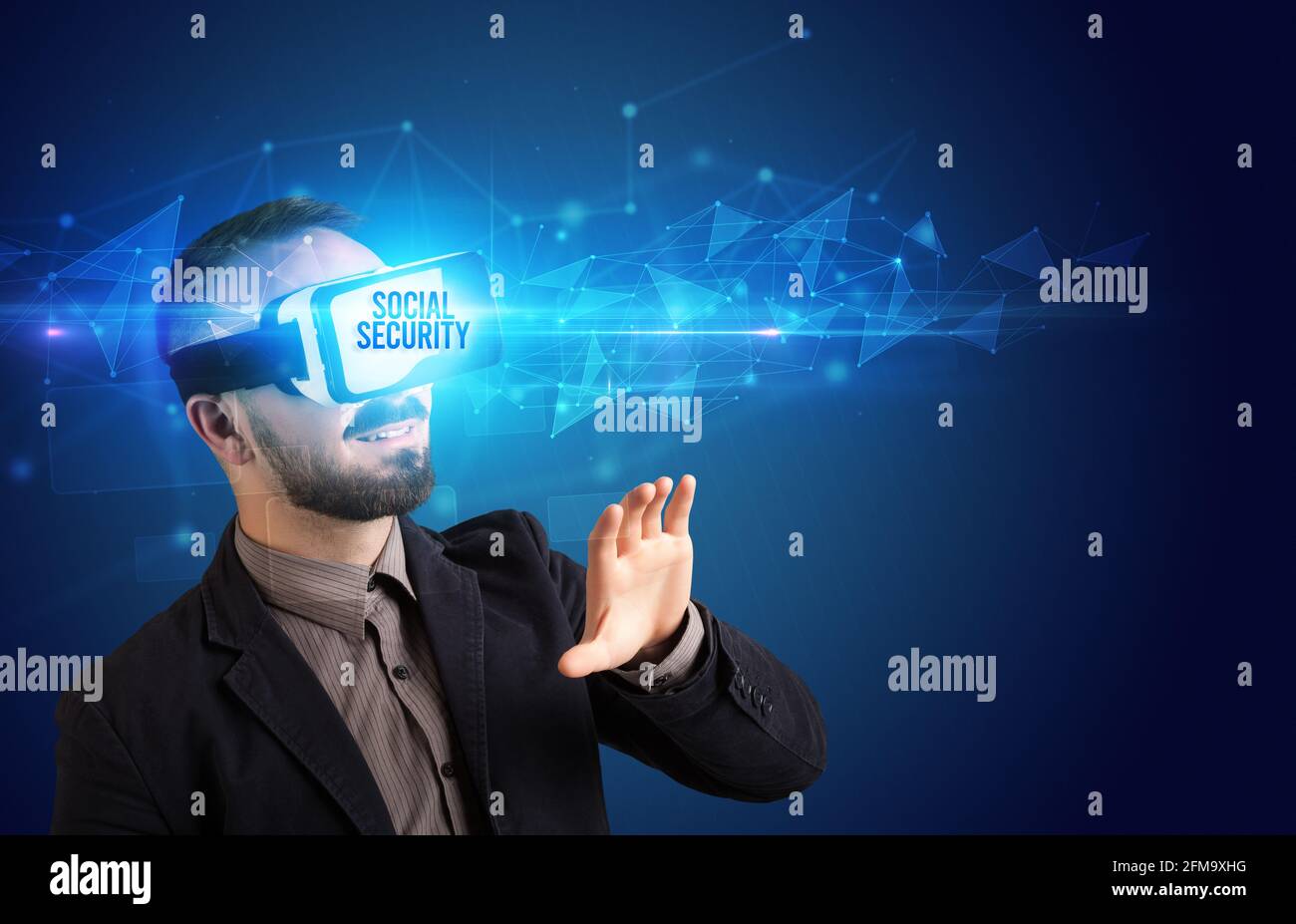 Businessman looking through Virtual Reality glasses, virtual security ...