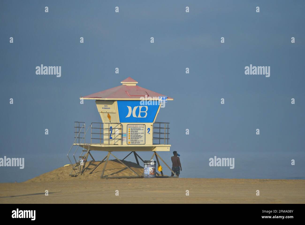 Landscape with a lifeguard under an HB watchtower on the sandy ...
