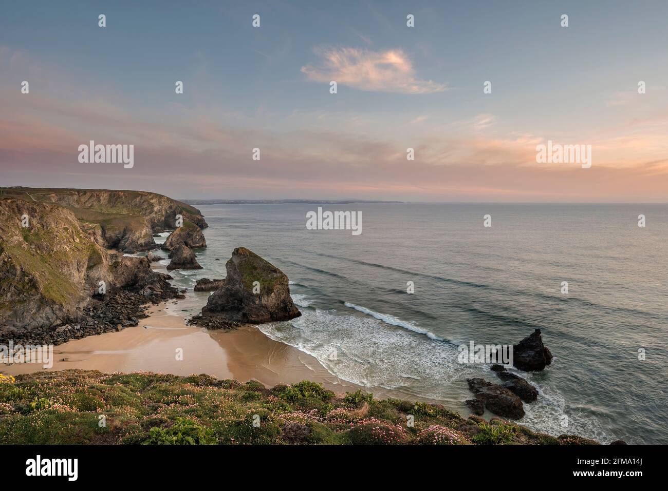 Stunning landscape image during golden hour on Cornwall coastline at ...