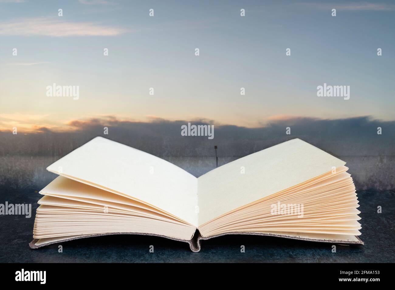 Beautiful sunrise landscape over rocks in sea coming out of pages in ...