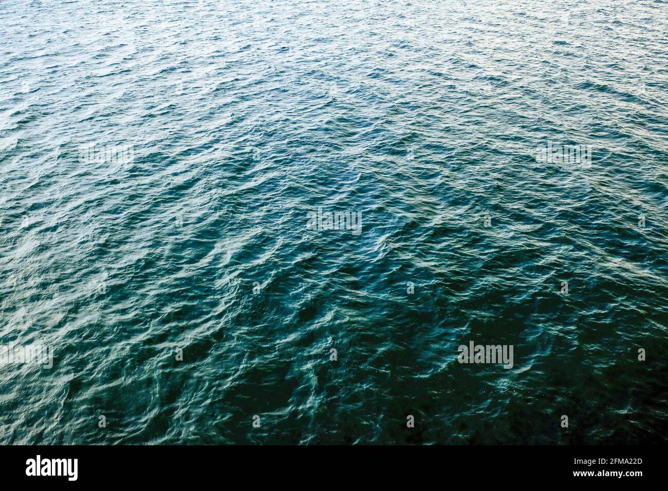 Calm sea water with small ripples for background and texture. Nature ...