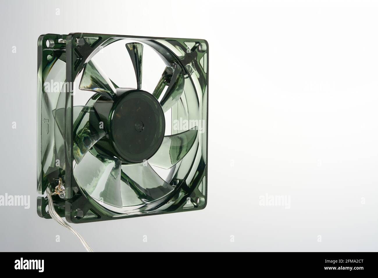 Computer translucent fan. Left side view of semitransparent pc cooler ...