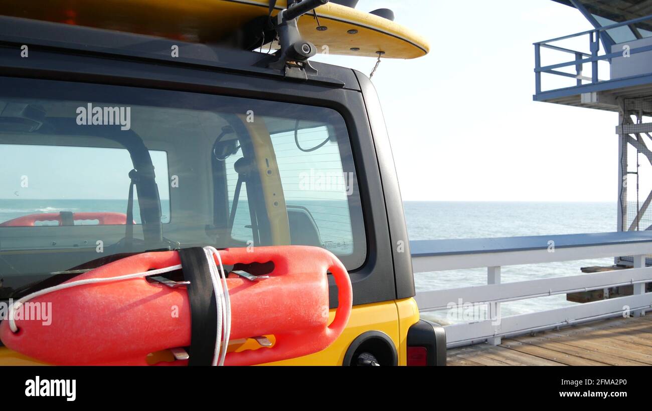 Yellow lifeguard car, San Clemente beach pier, California USA ...