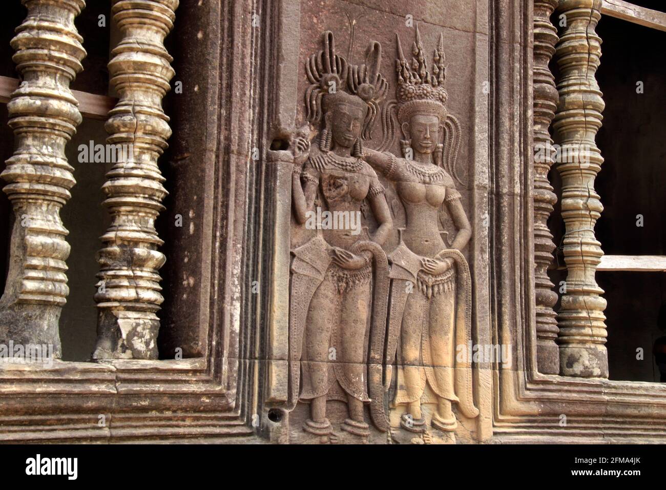 Bas-Reliefs on the window of Angkor Wat Cambodia Stock Photo - Alamy