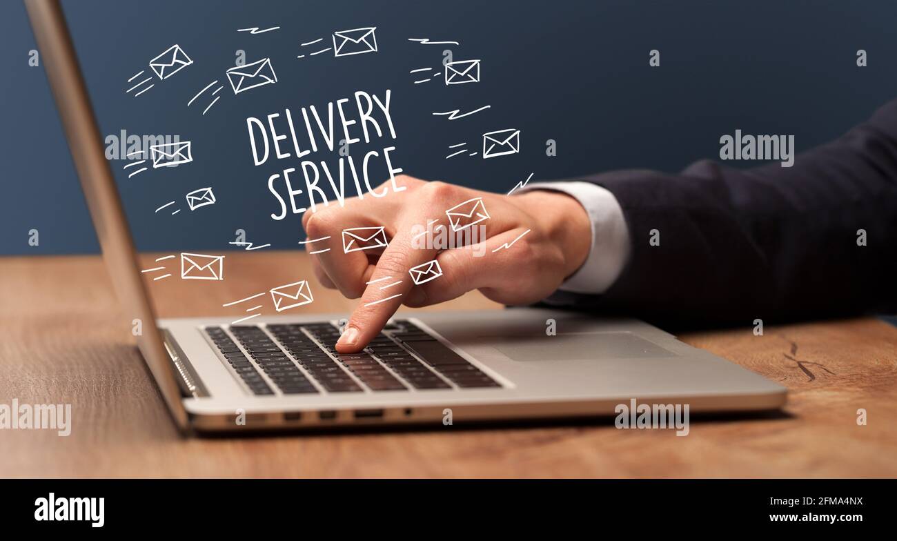 Businessman working on laptop, e-commerce concept Stock Photo - Alamy