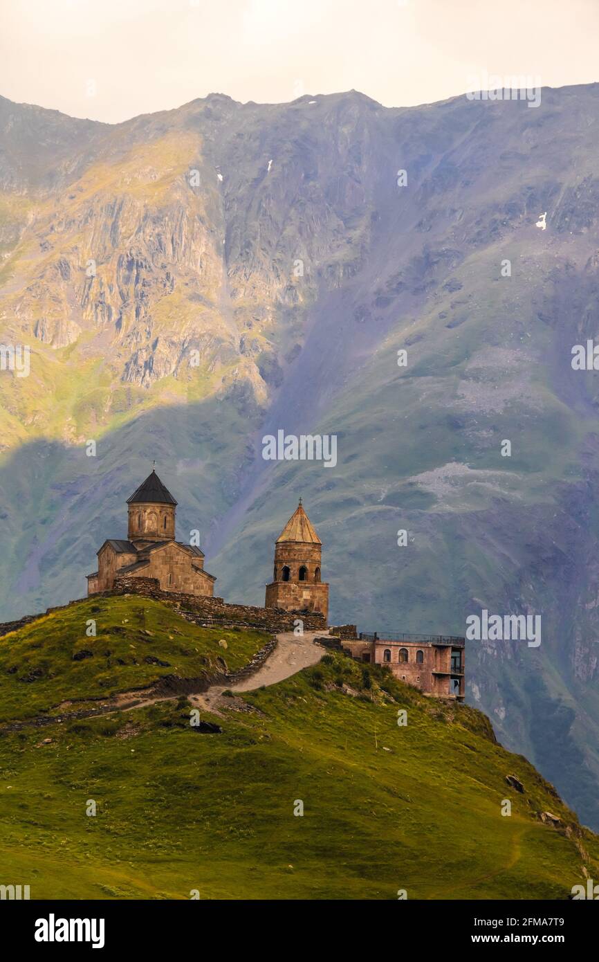 14th century Gergeti Trinity Church in Georgia near the northern border ...