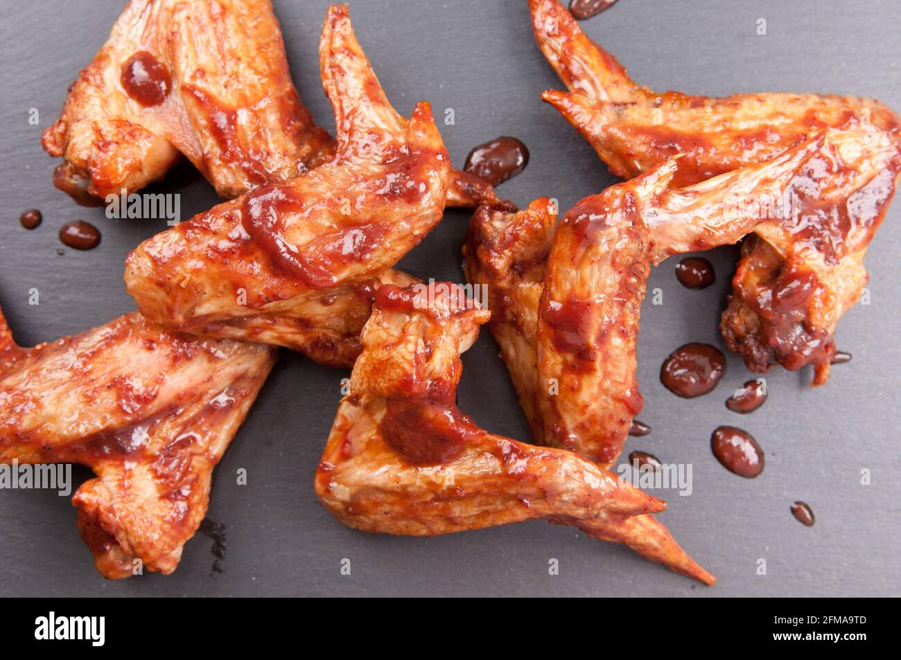 whole chicken wings with sauce Stock Photo - Alamy