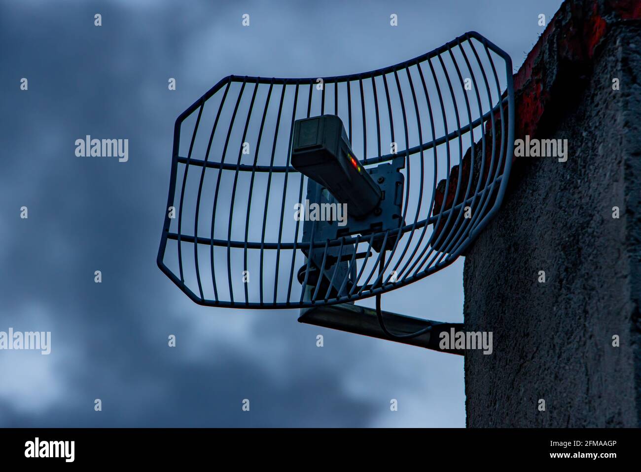 An outdoor WiFi Access Point mounted at chimney. A antenna for internet ...