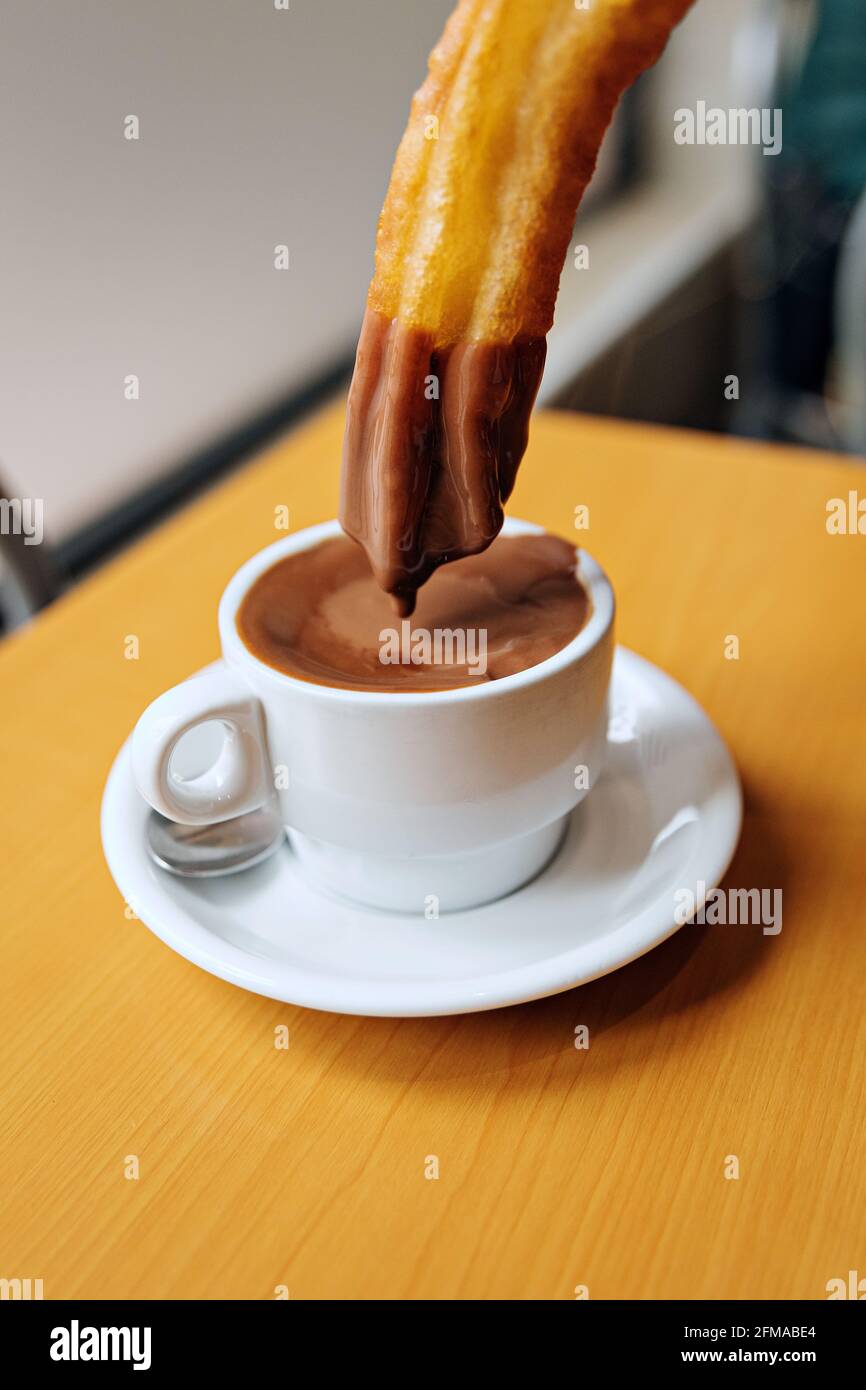 Hot chocolate churro in hi-res stock photography and images - Alamy