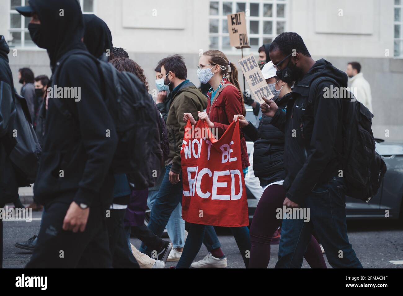 Westminster, London | UK - 2021.05.01: People wearing masks and waving ...