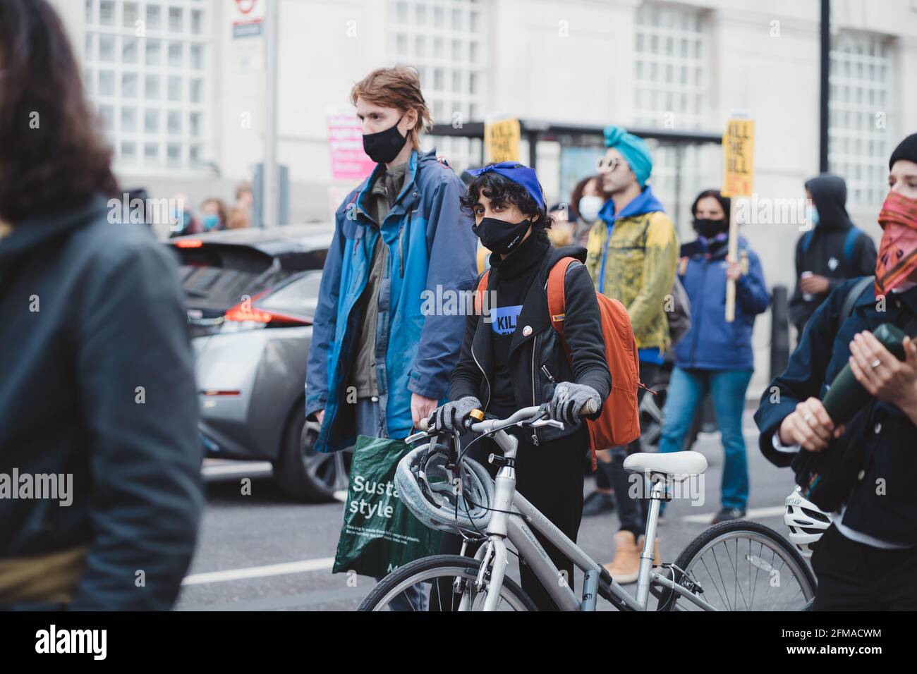 Westminster, London | UK - 2021.05.01: People wearing masks and waving ...