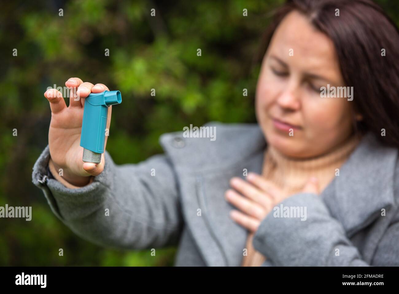 Pretty Young Brunette Woman Having Asthma Attack She Is Holding