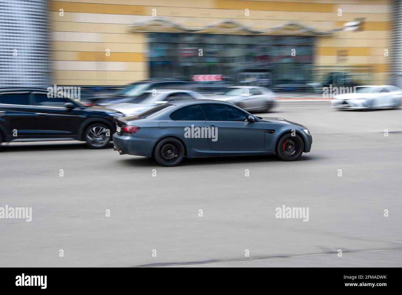 Ukraine, Kyiv - 26 April 2021: Gray BMW M3 car moving on the street ...