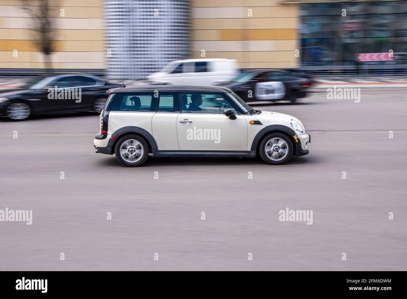 Ukraine, Kyiv - 26 April 2021: White MINI Clubman car moving on the ...