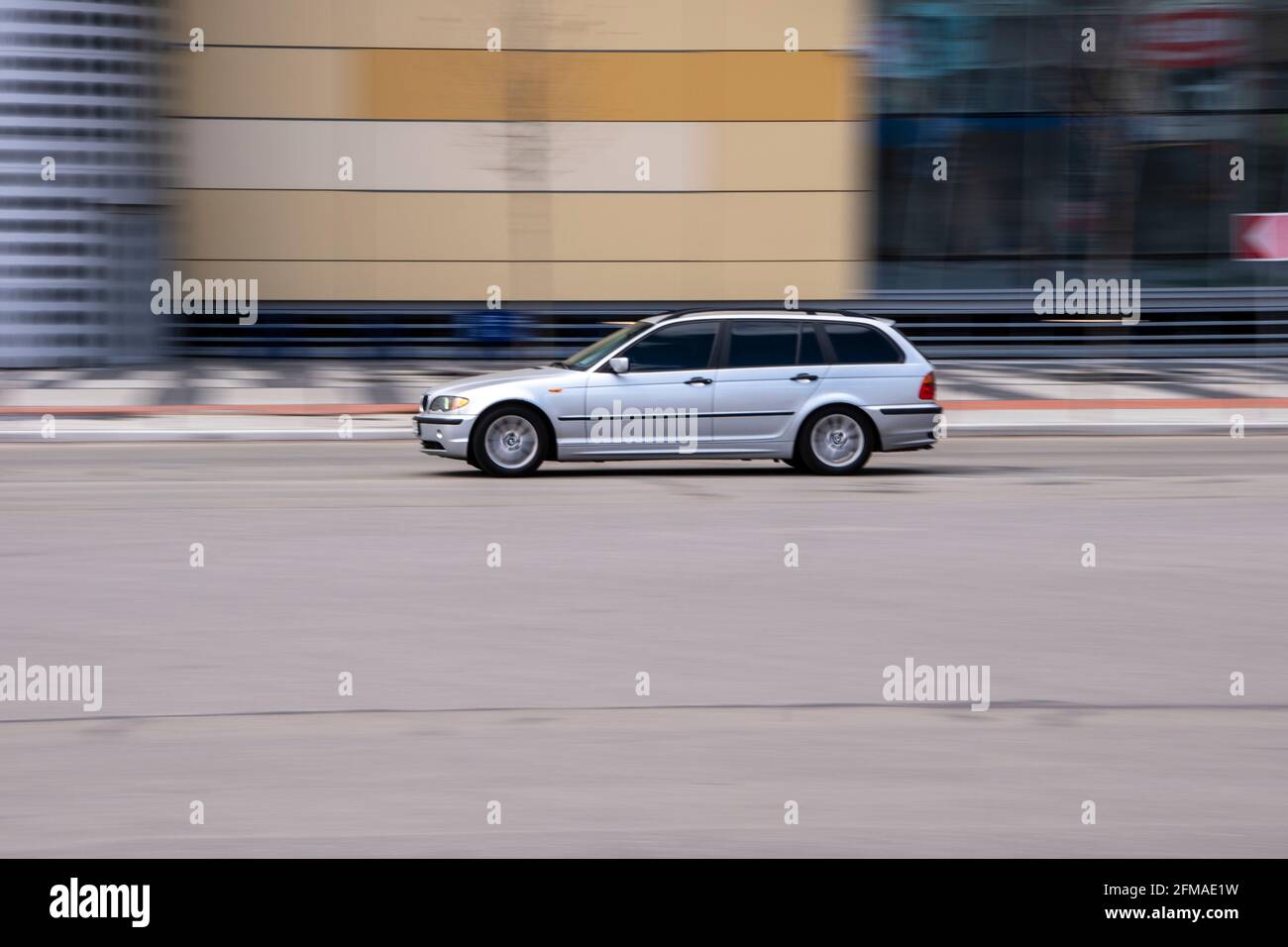 Ukraine, Kyiv - 26 April 2021: Silver BMW 3 Series car moving on the ...