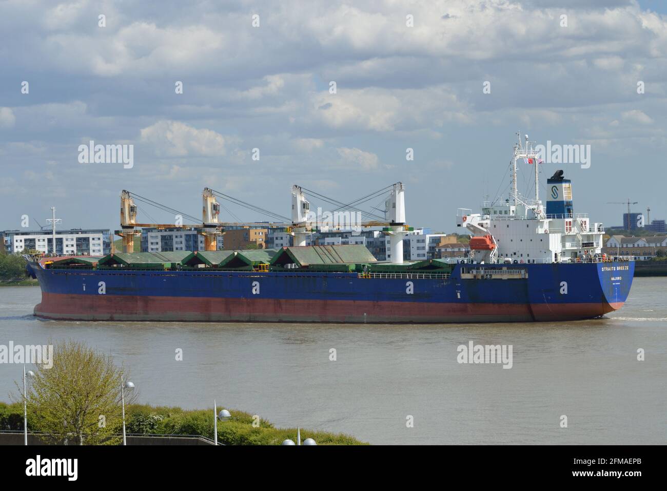 Cargo ship Straits Breeze departing London after unloading a cargo of ...