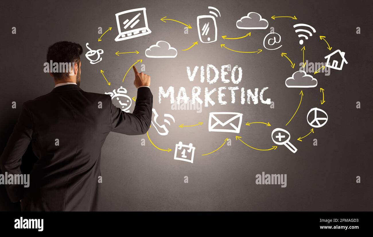 businessman drawing social media icons Stock Photo - Alamy