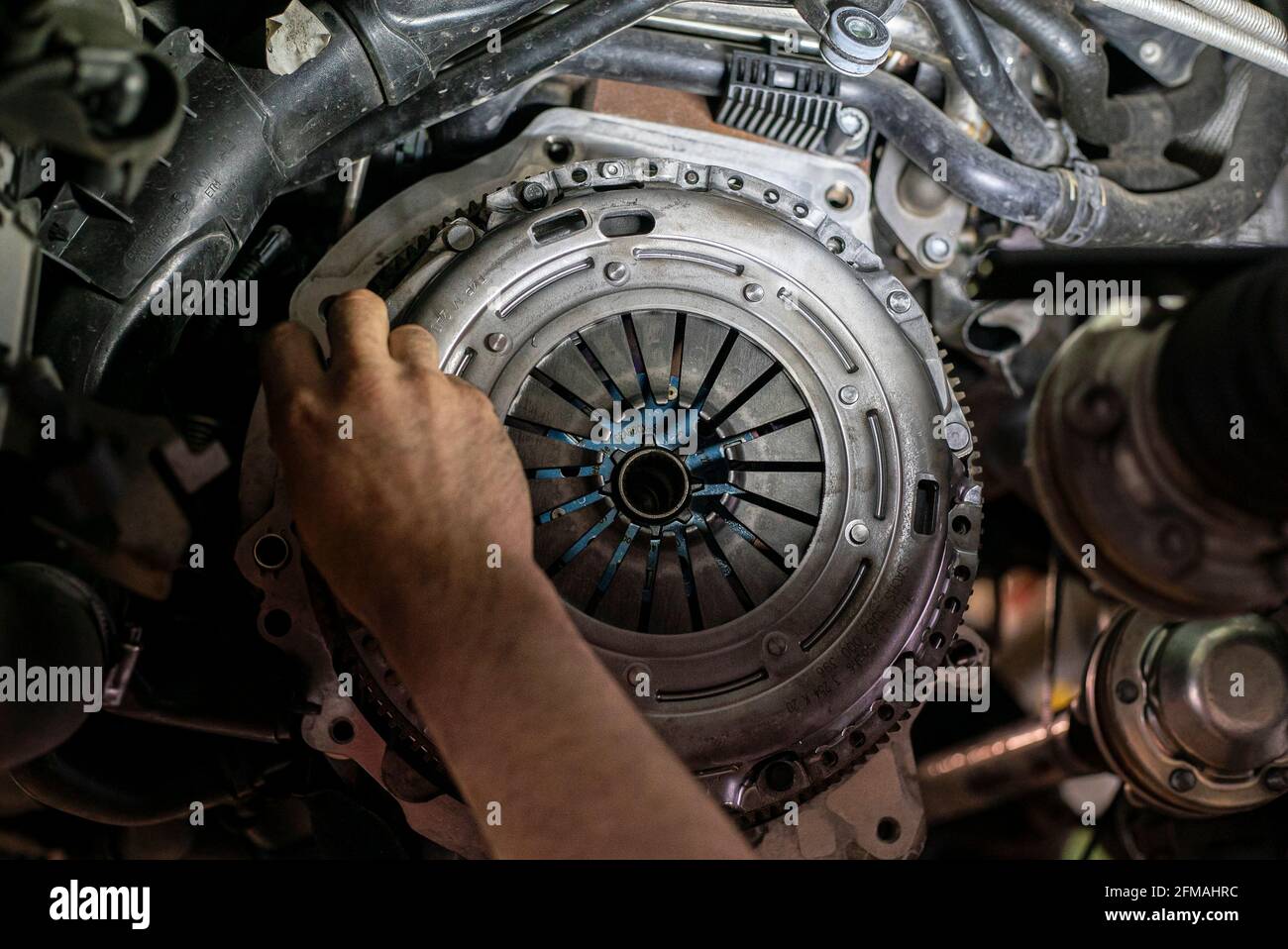 Detail of Car clutch assembly in a workshop, car reparation engine ...