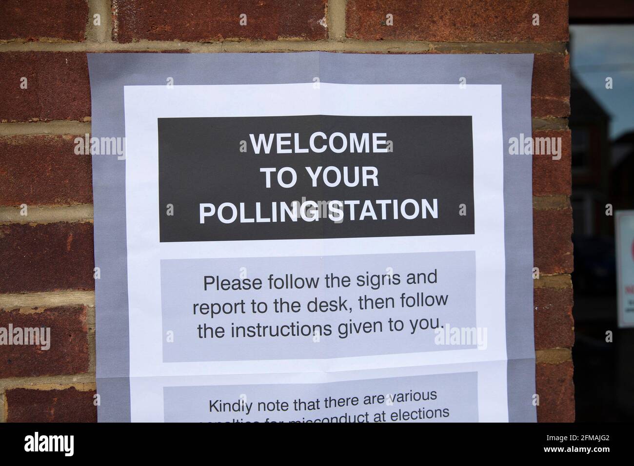 Polling station sign outside the entrance to a political voting ...
