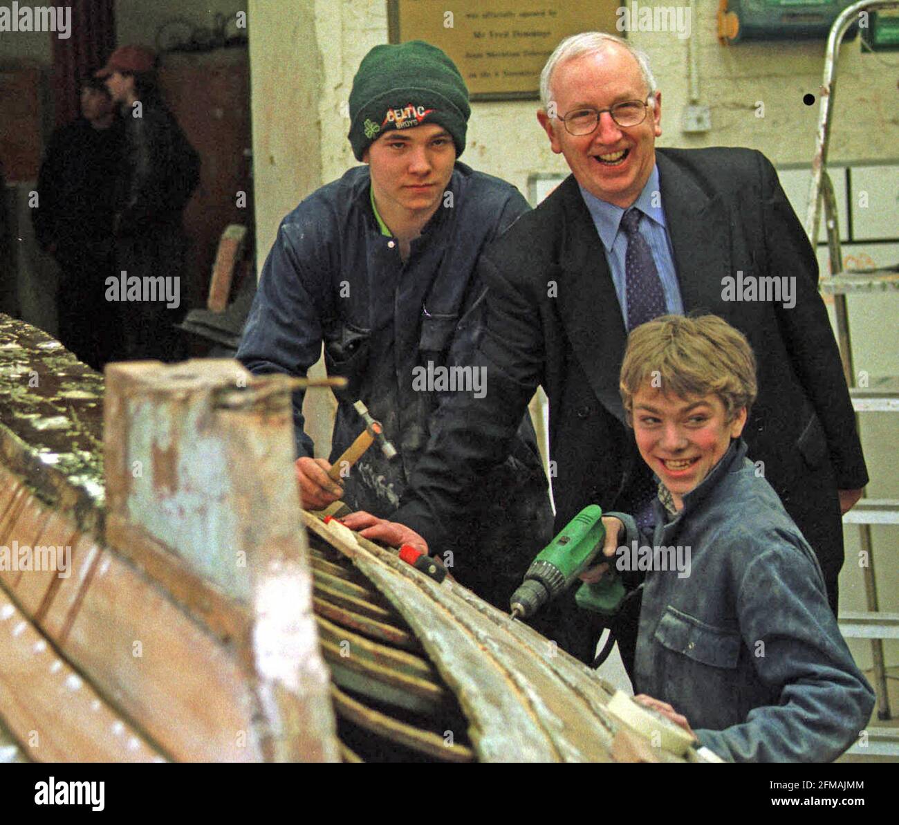 MINISTER GEORGE MOODY WITH YOUNGSTERS DEAN RYAN (LEFT) AND ANDY STOREY ...