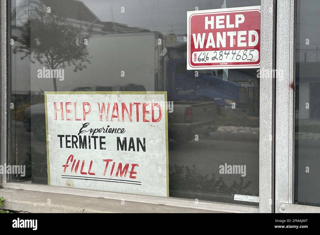 A Help Wanted sign at Royal Termite Control, Friday, May 7, 2021, in ...