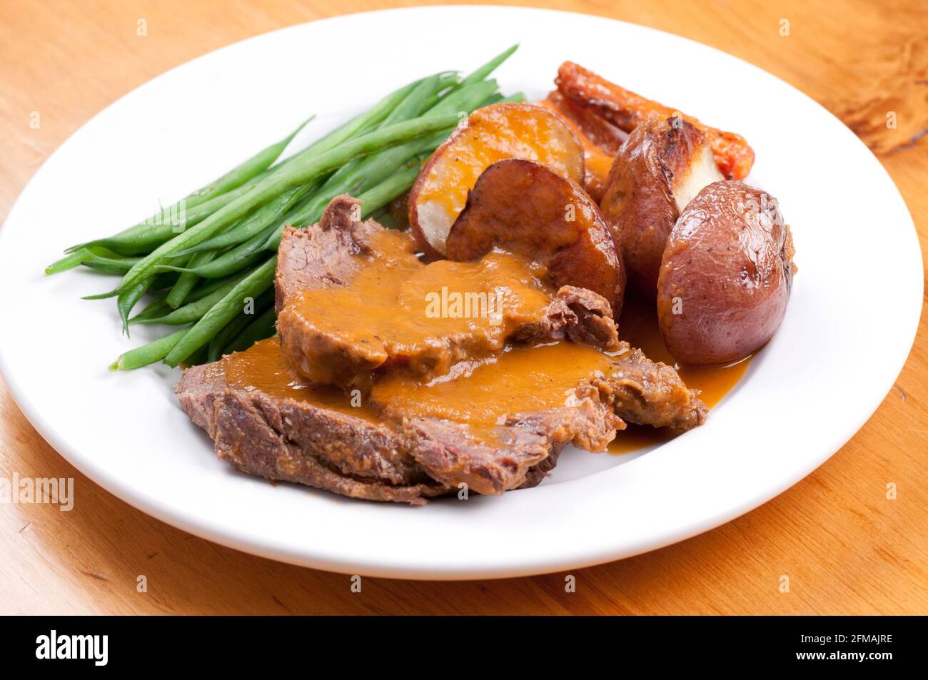 cross rib roast dinner with roasted vegetables Stock Photo - Alamy