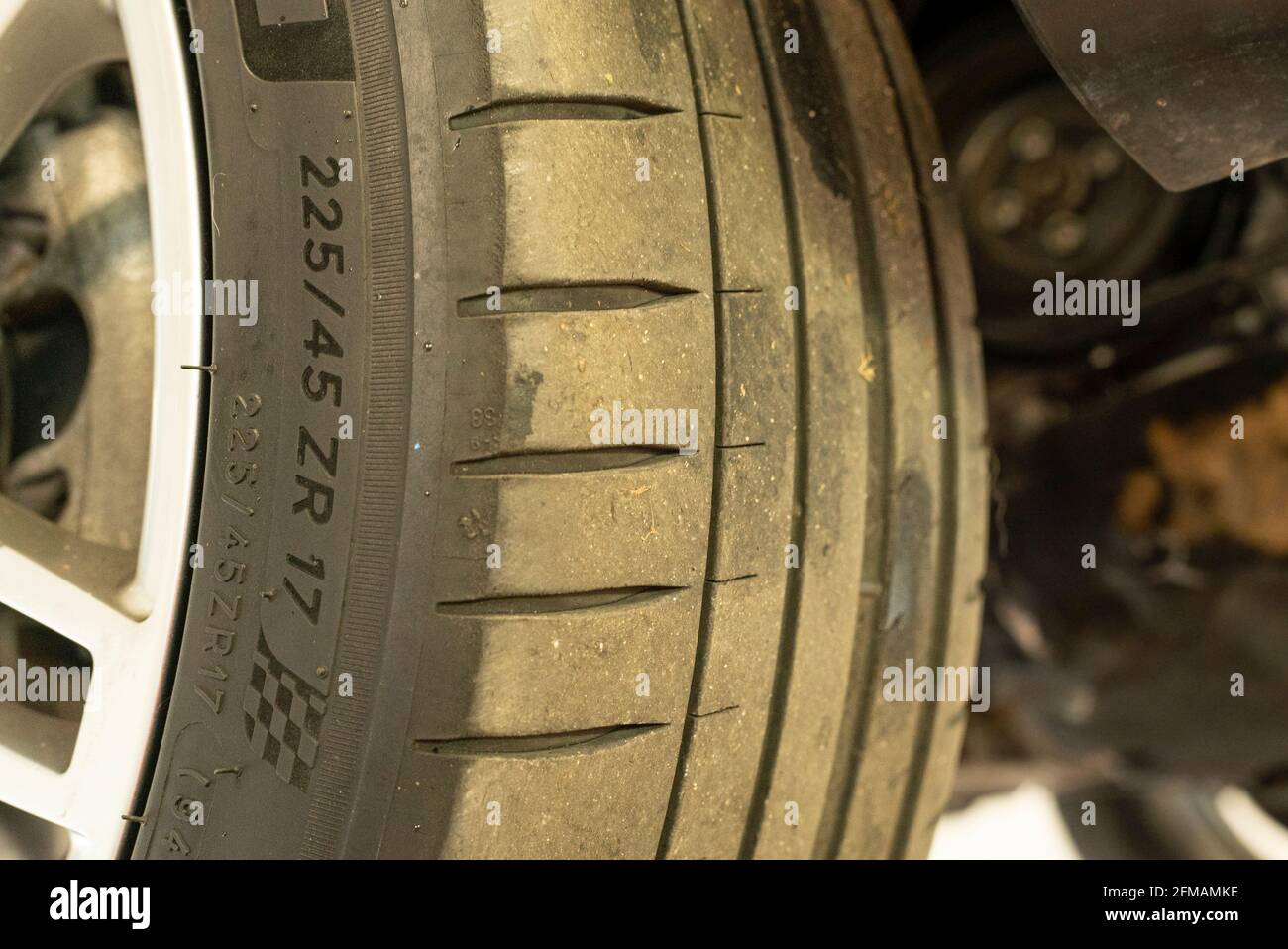 Detail of Car tire size indication, car wheel Stock Photo - Alamy
