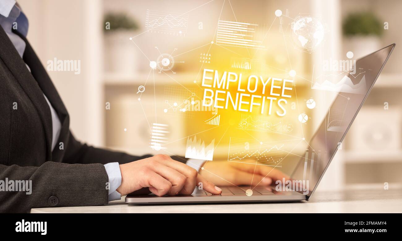 Side view of a business person working on laptop Stock Photo - Alamy