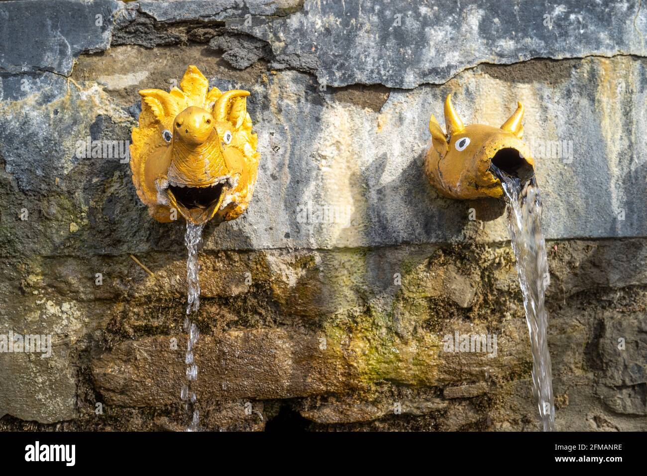 Well system with the 108 bull-headed gargoyles at the pilgrimage site ...