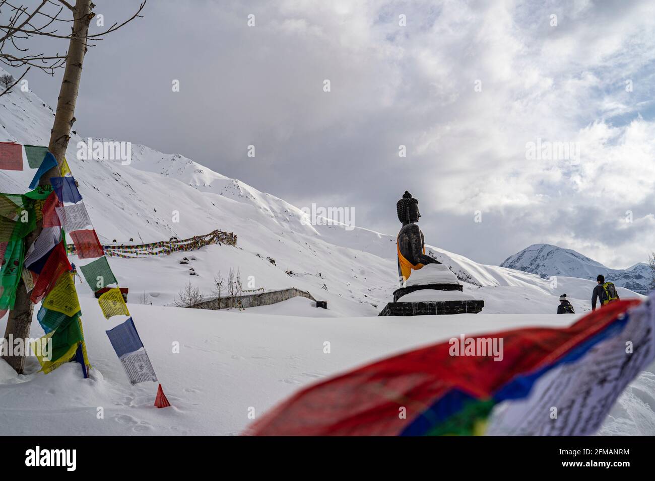 Hikers at the Sakyamuni Buddha statue in the pilgrimage site of ...