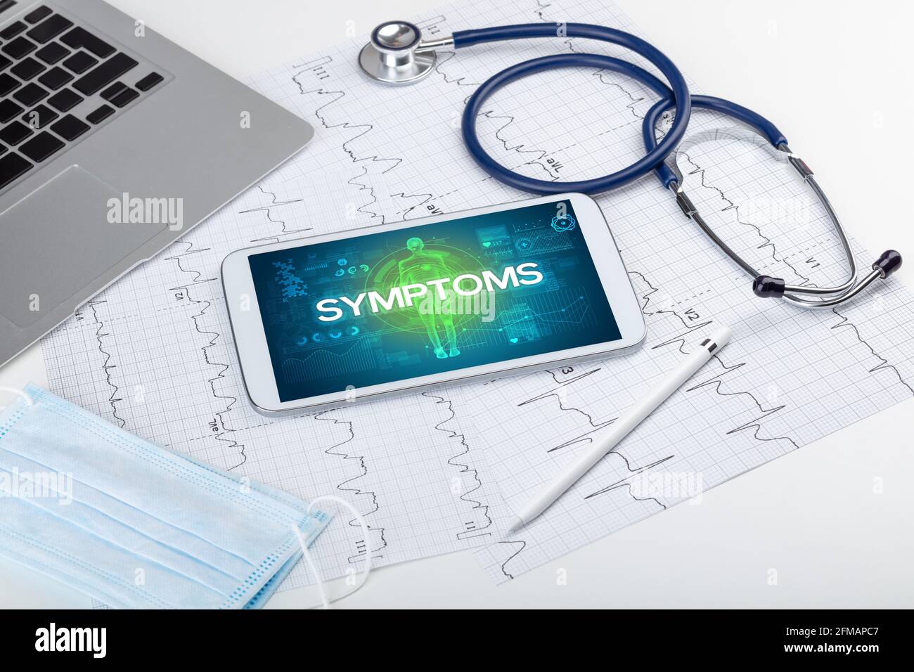 Tablet pc and doctor tools Stock Photo - Alamy