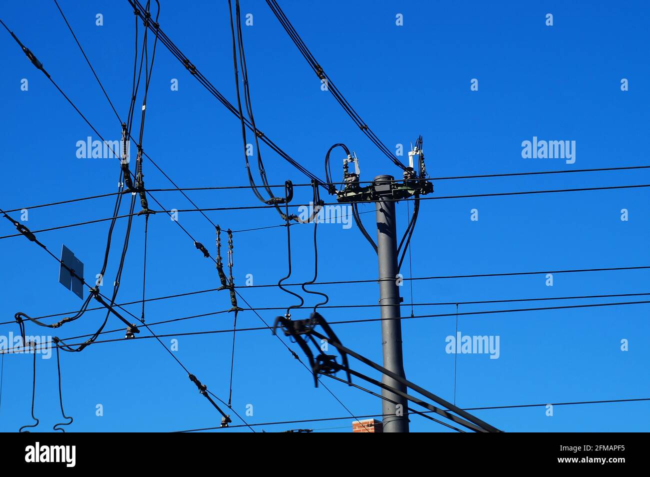 Power feed to an overhead line Stock Photo - Alamy