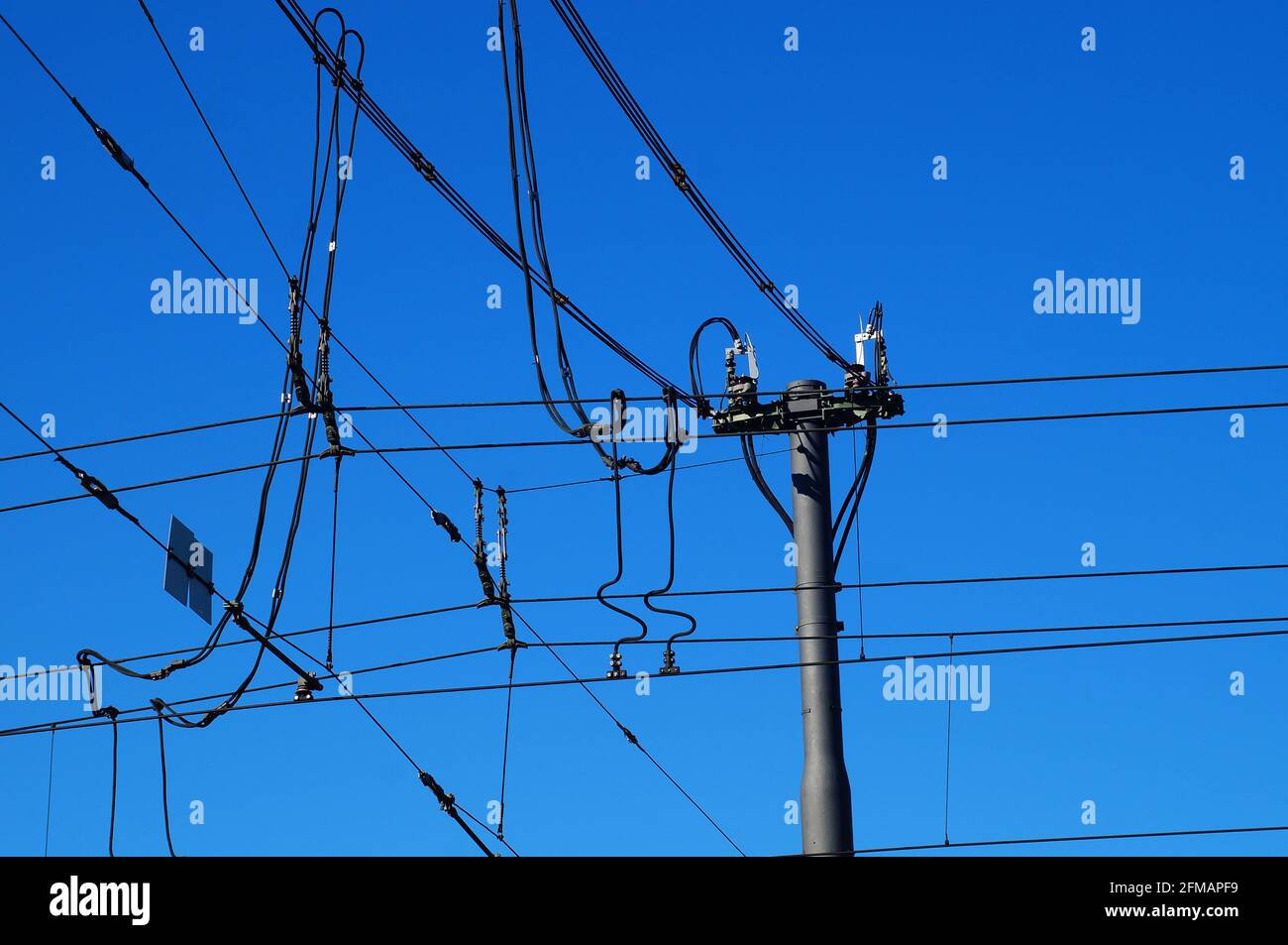 Power feed to an overhead line Stock Photo - Alamy