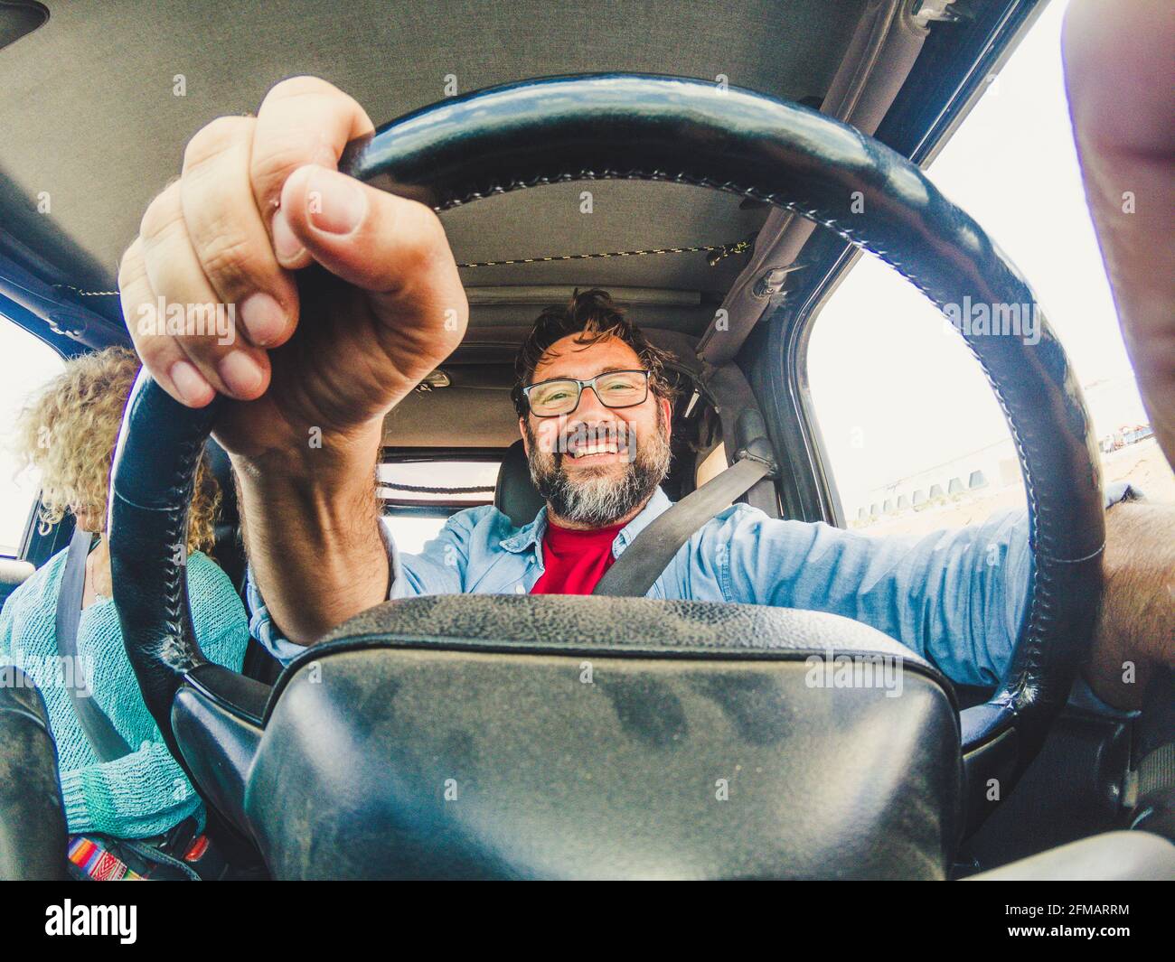 Concept of caucasian couple travel with car vehicle - inside wide view ...