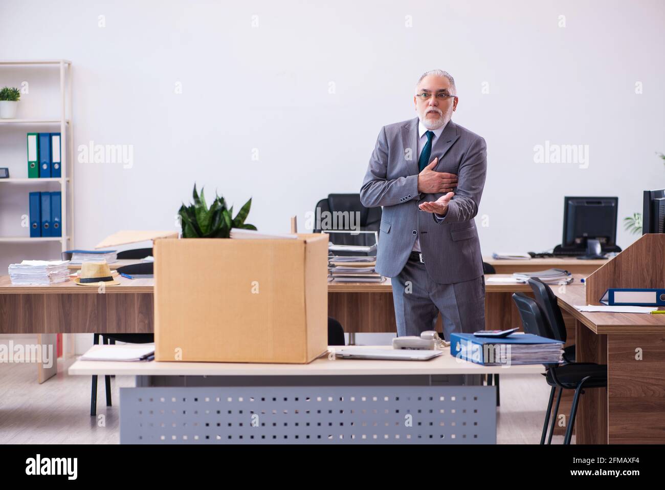 Old employee being fired from his work Stock Photo - Alamy