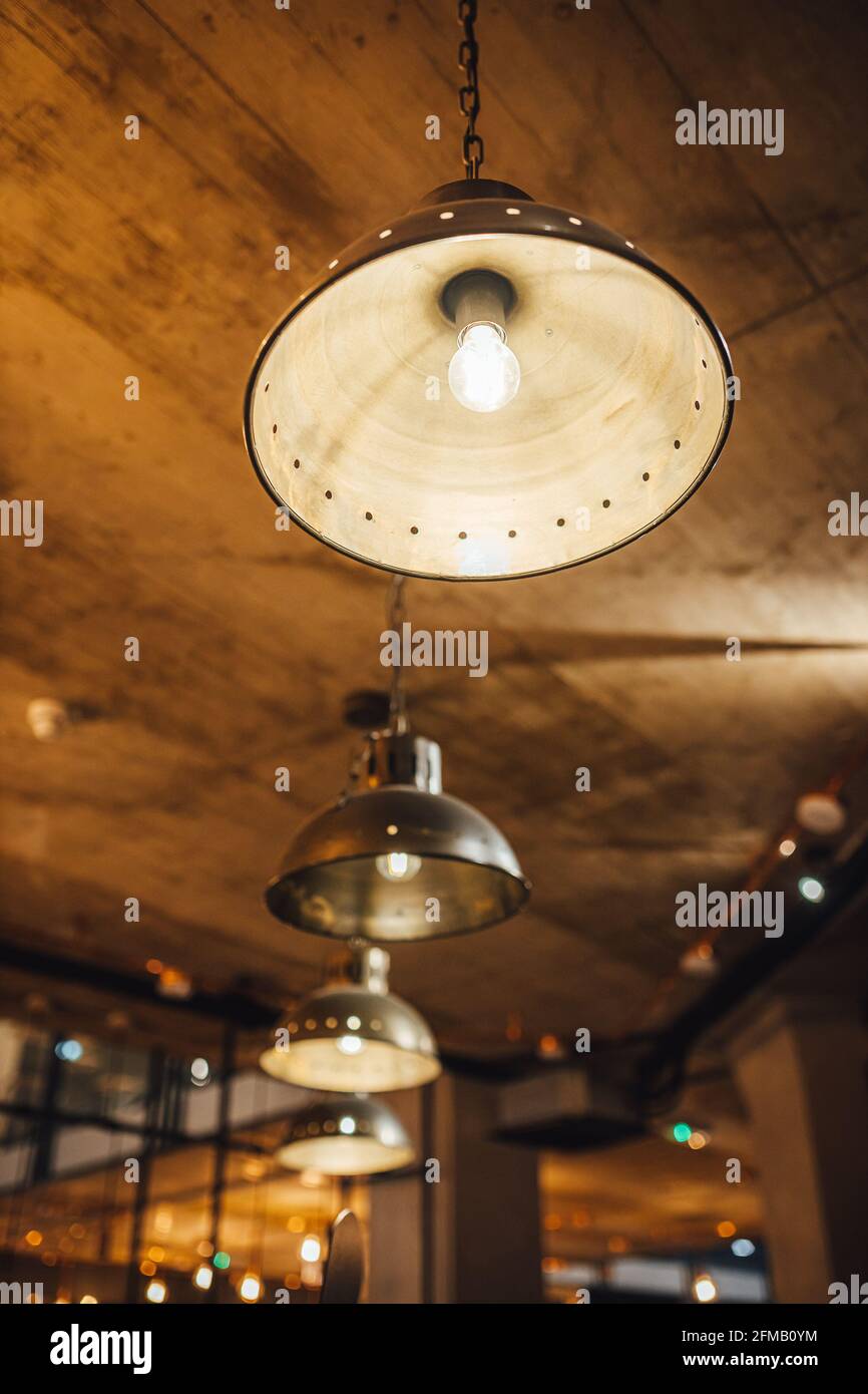 Large chandelier hanging from ceiling hi-res stock photography and ...
