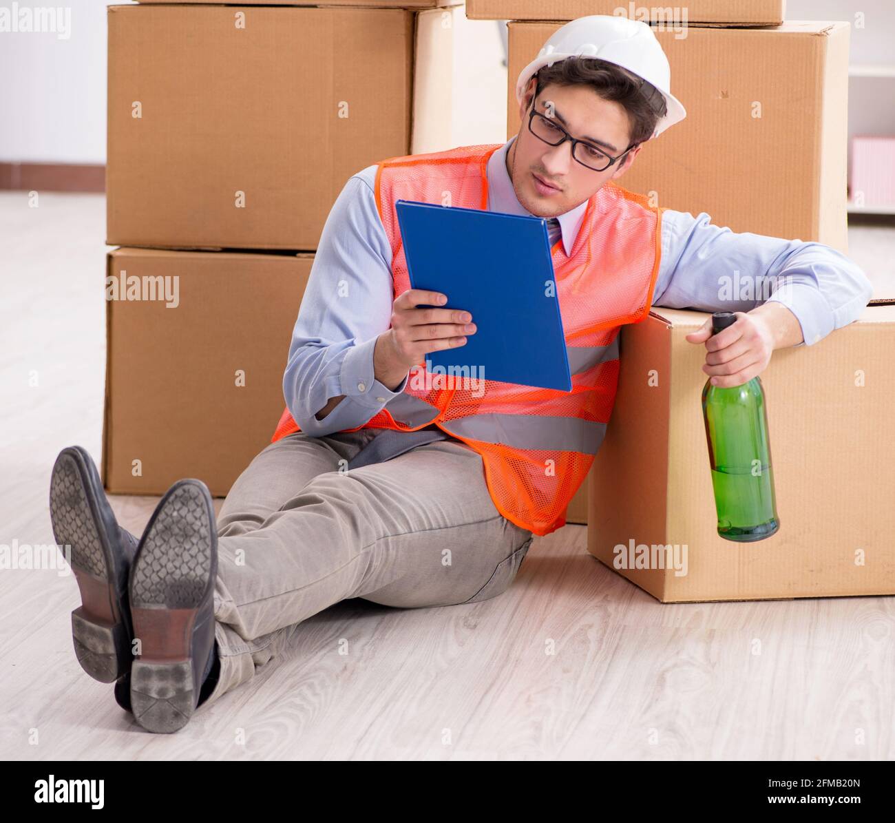 The delivery man drunk at work Stock Photo - Alamy