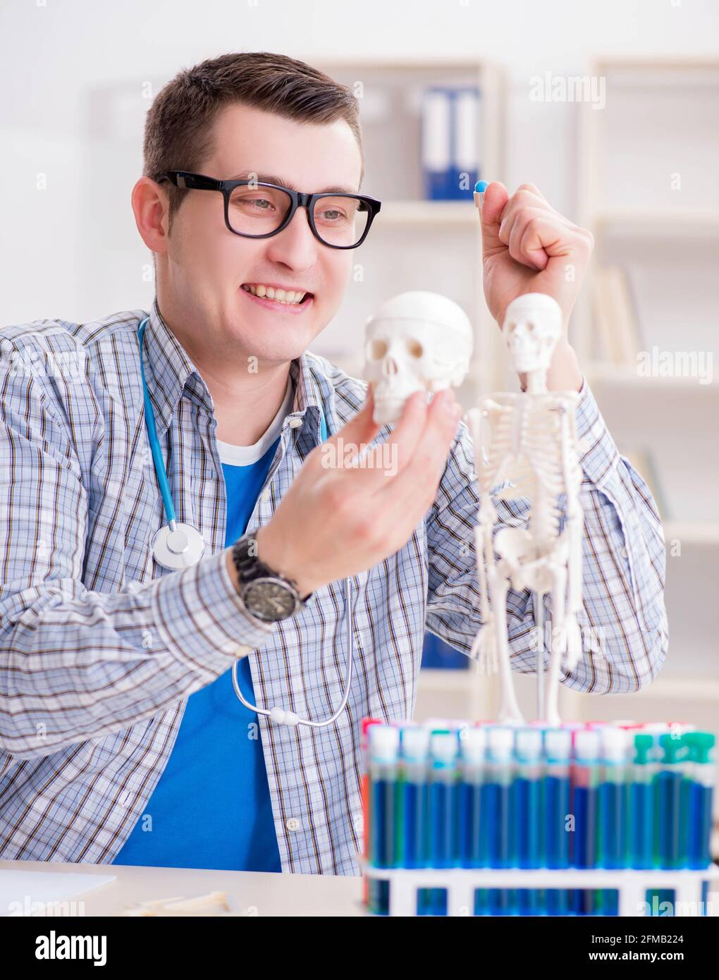 The medical student studying skeleton in classroom during lecture Stock ...