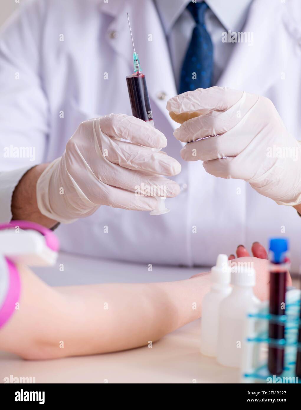 The patient during blood test sampling procedure taken for analysis ...