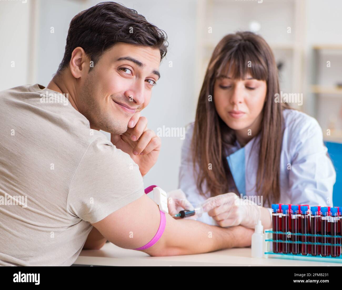 The patient during blood test sampling procedure taken for analysis ...