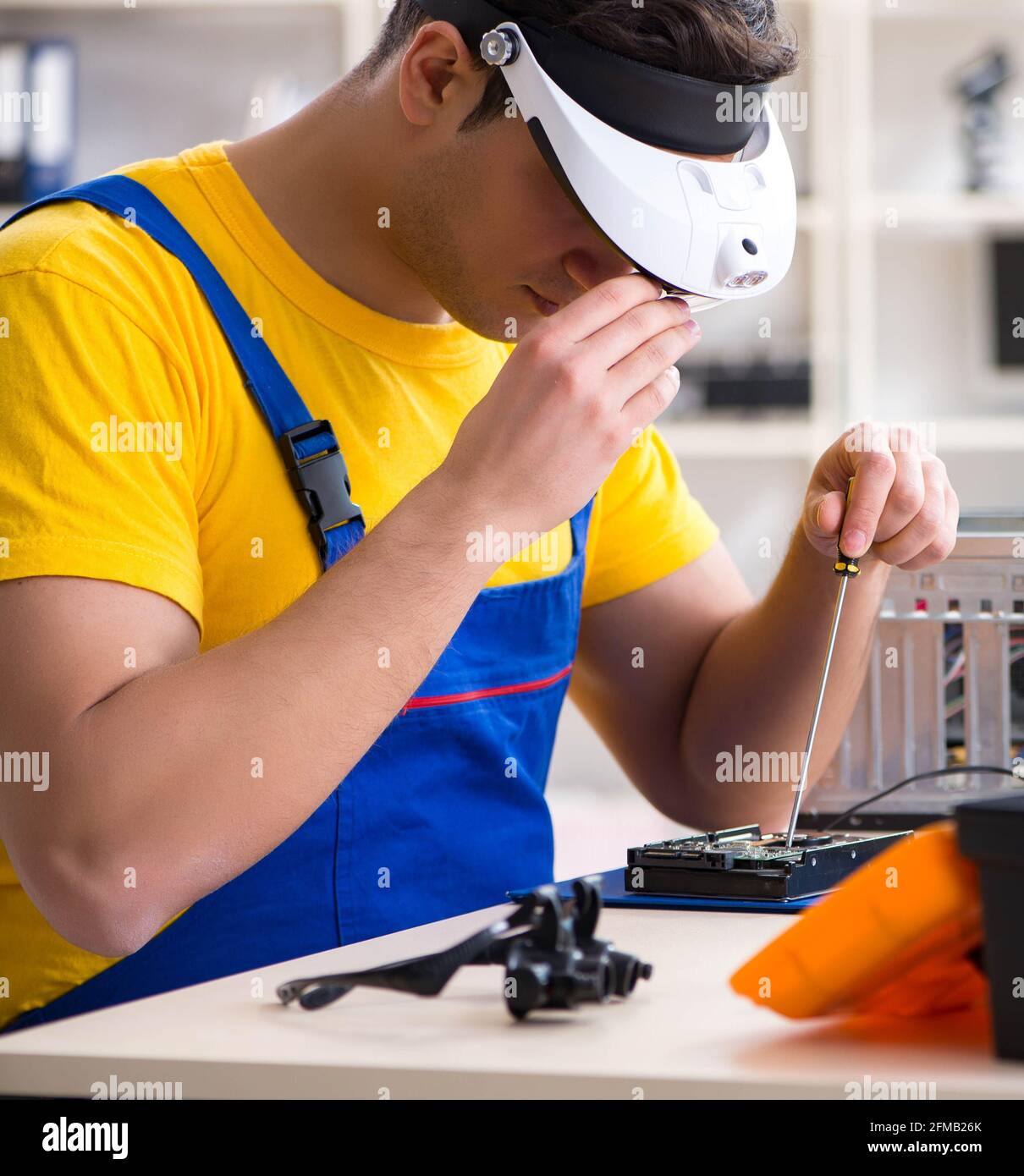 The computer repair technician repairing hardware Stock Photo - Alamy