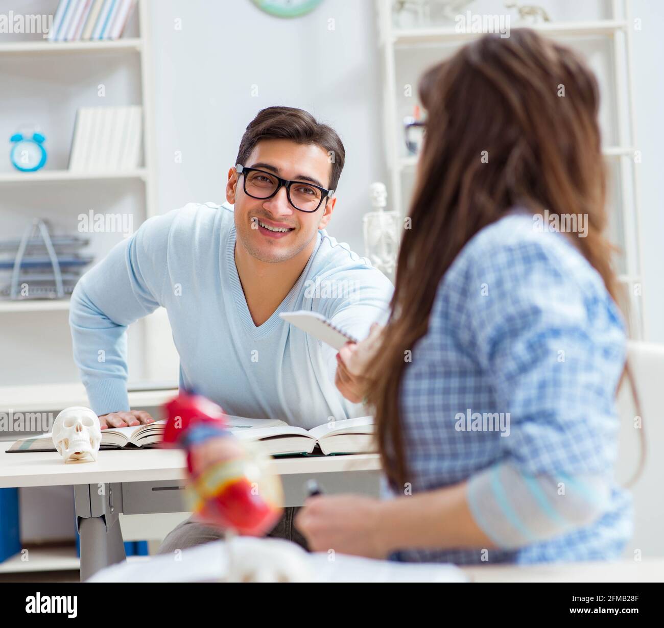 The two medical students studying in classroom Stock Photo - Alamy