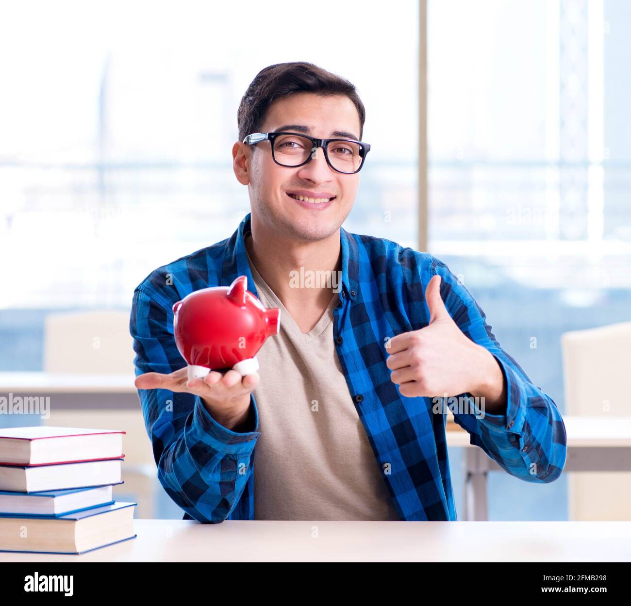 The concept of affordable textbooks and cost of education Stock Photo ...