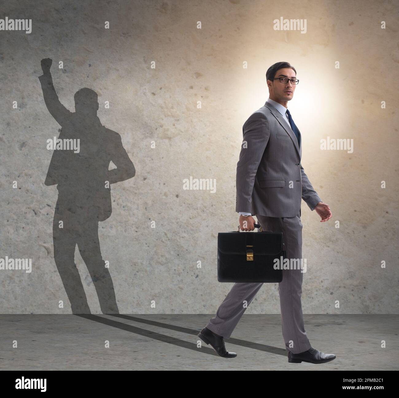 The businessman and his shadow in business concept Stock Photo - Alamy